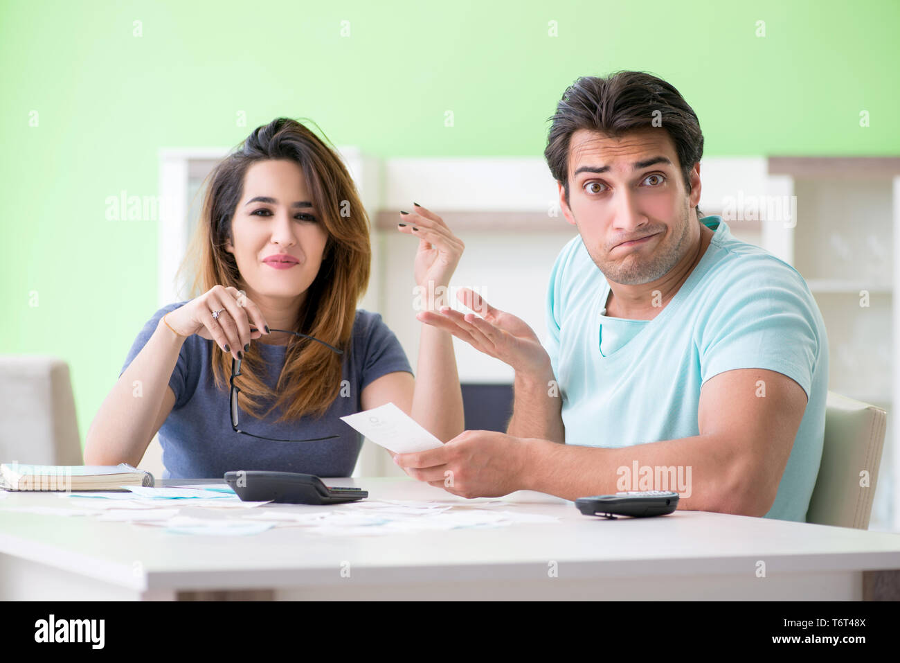 Young family struggling with personal finance Stock Photo - Alamy