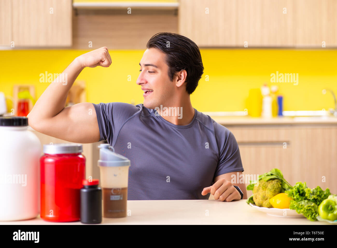 Young man in healthy eating concept Stock Photo - Alamy