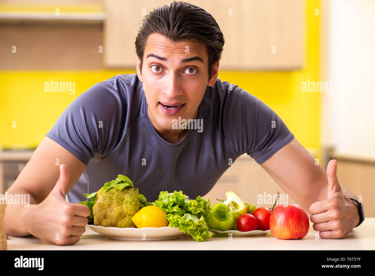 Young man in dieting and healthy eating concept Stock Photo - Alamy
