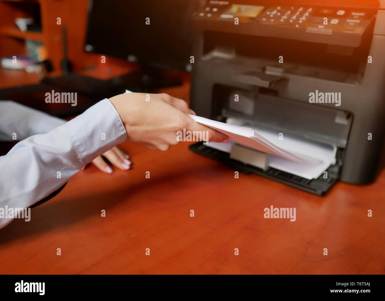 paper in printer. sets the paper stack in the laser printer Stock Photo ...