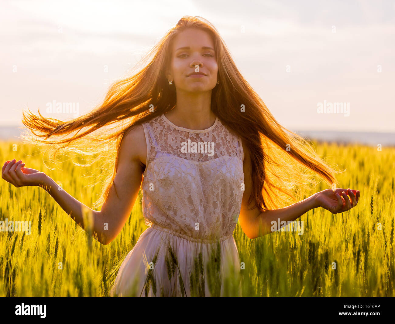 Girl with long flowing hair hi-res stock photography and images - Alamy