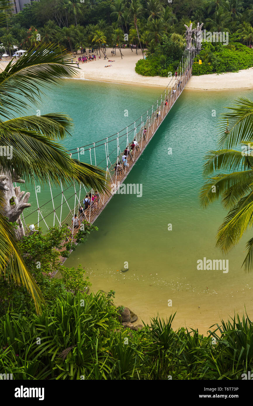Hanging bridge to Palawan island in Sentosa Singapore Stock Photo - Alamy