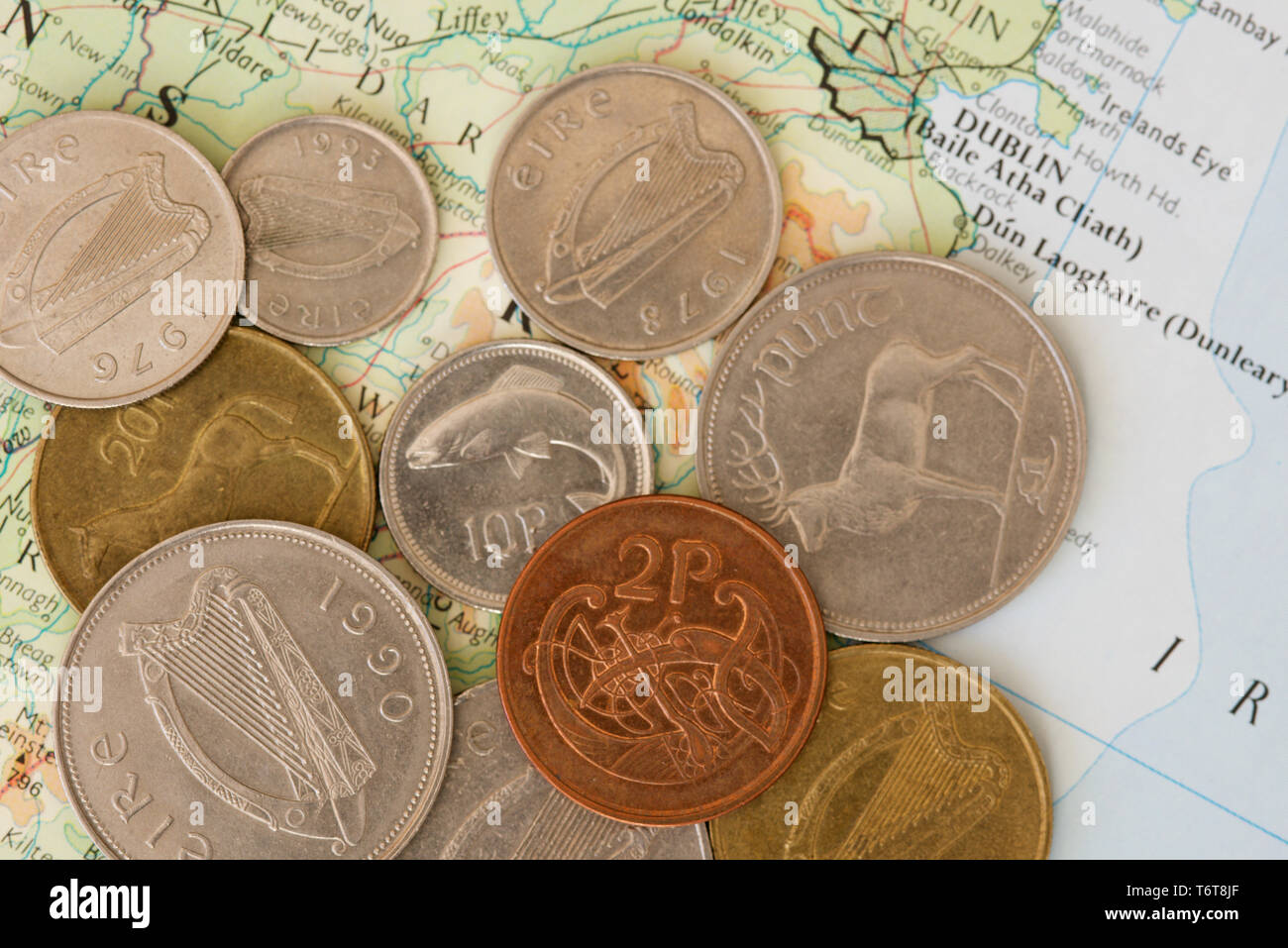 Irish coins and map of Ireland Stock Photo - Alamy