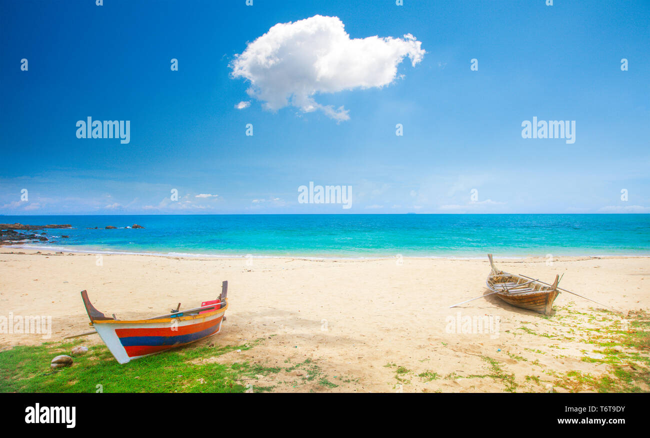 beach and fishing boat, koh Lanta, Thailand Stock Photo - Alamy