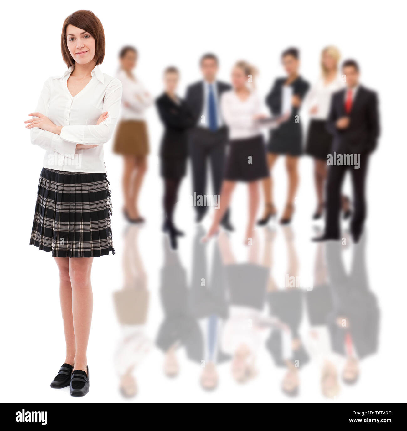 businesswoman as a leader and her business team in back Stock Photo - Alamy
