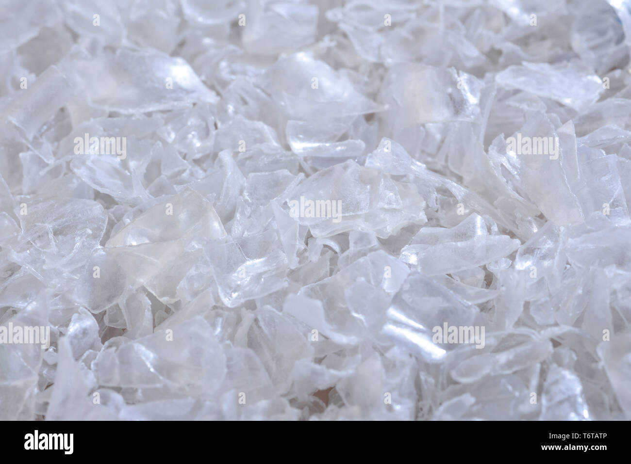 Flakes of crushed plastic bottles as raw material for further ...