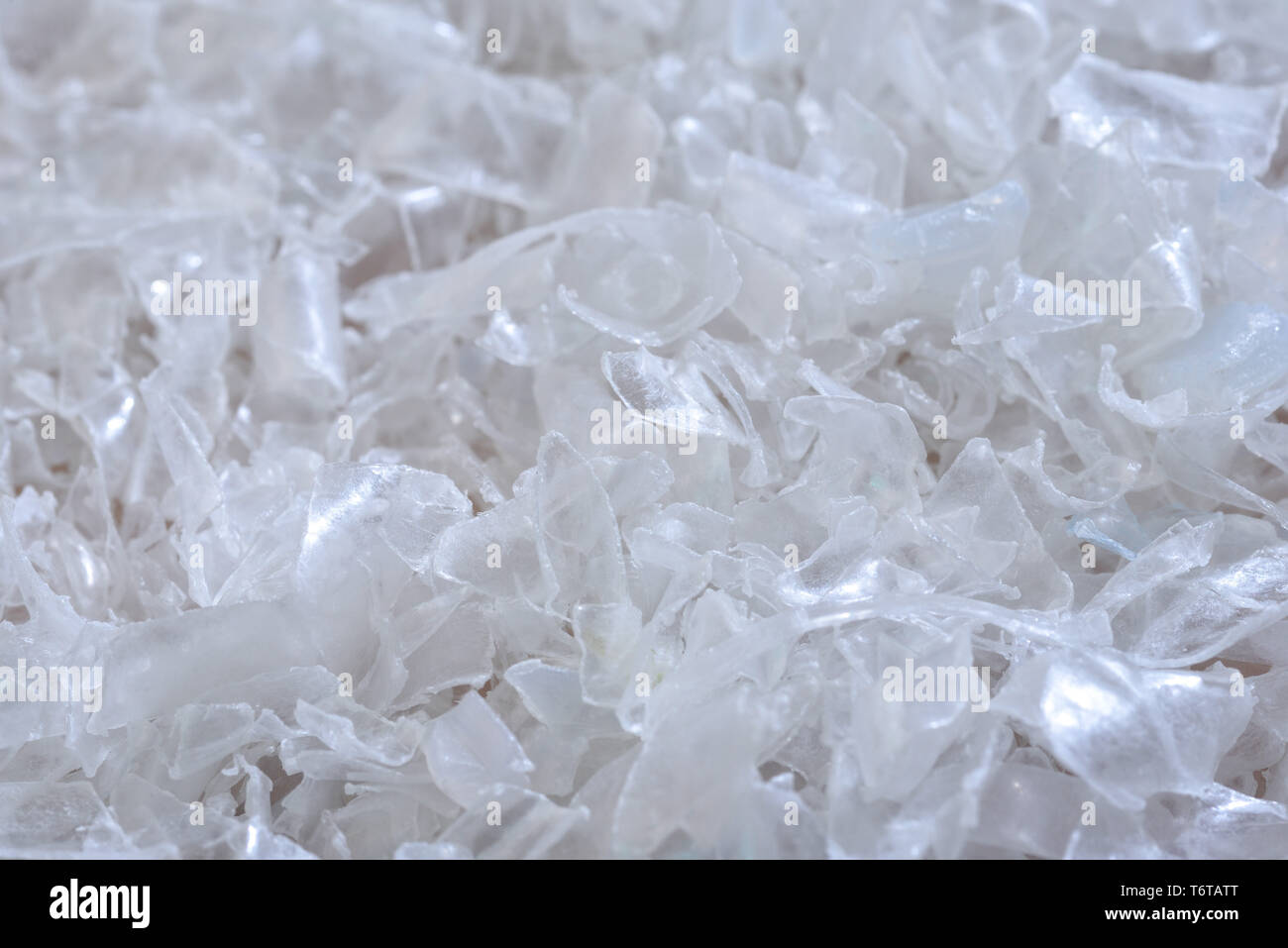 Flakes of crushed plastic bottles as raw material for further ...