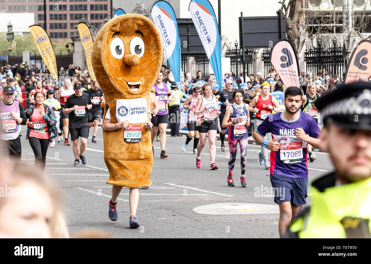 London, England – April 28, 2019: A man running as a spoon takes the ...