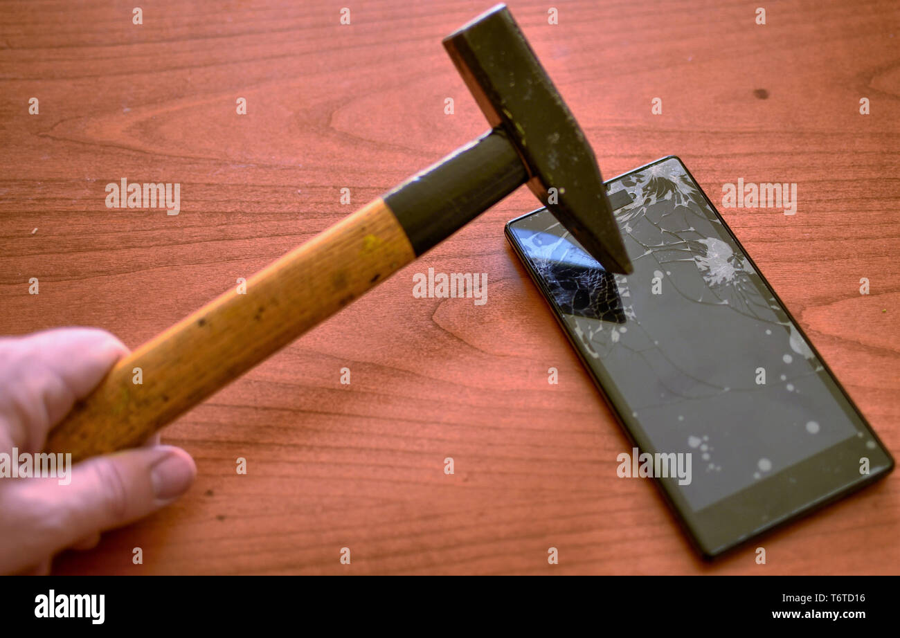 The tip of the hammer hit the screen of the smartphone: a network of ...