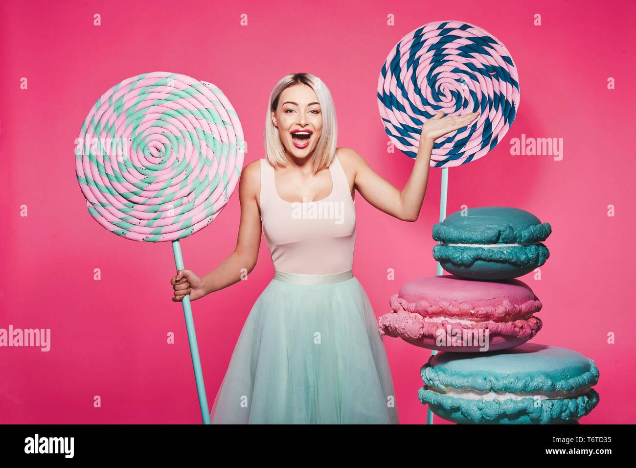 Attractive model with sweets Stock Photo - Alamy