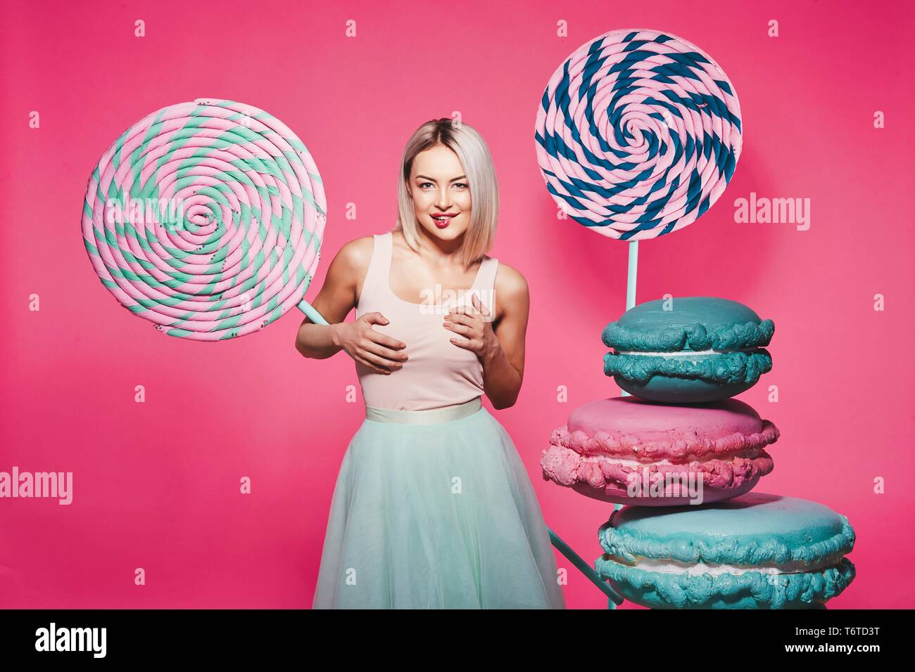 Attractive model with sweets Stock Photo - Alamy