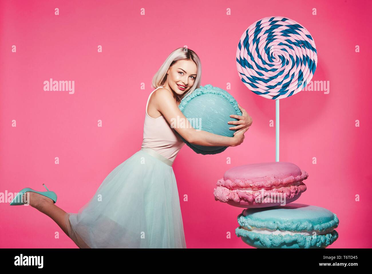 Attractive model with sweets Stock Photo - Alamy