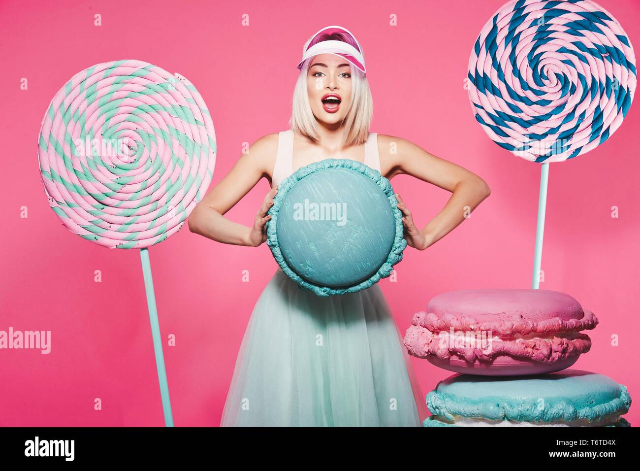 Attractive model with sweets Stock Photo - Alamy