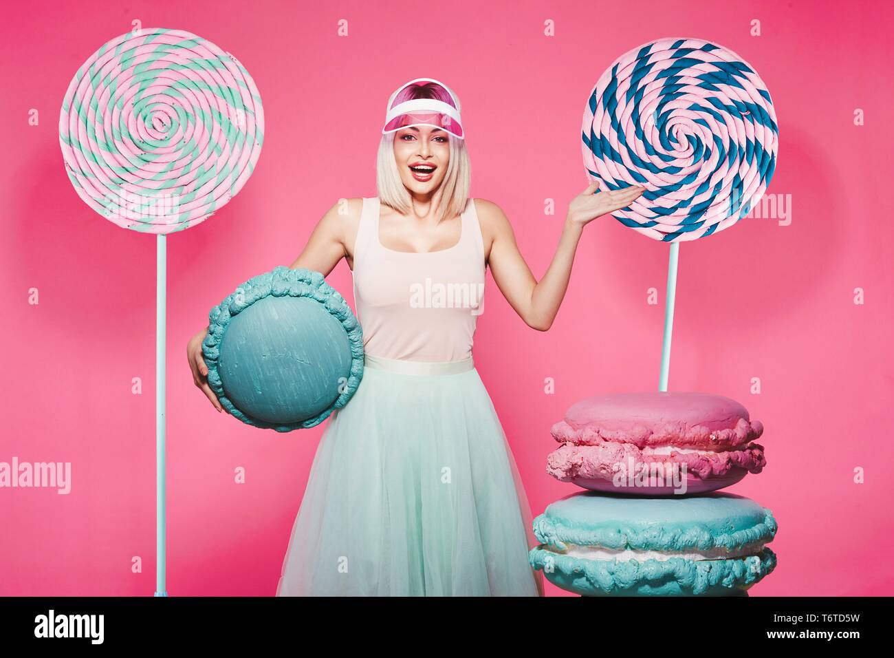 Attractive model with sweets Stock Photo - Alamy