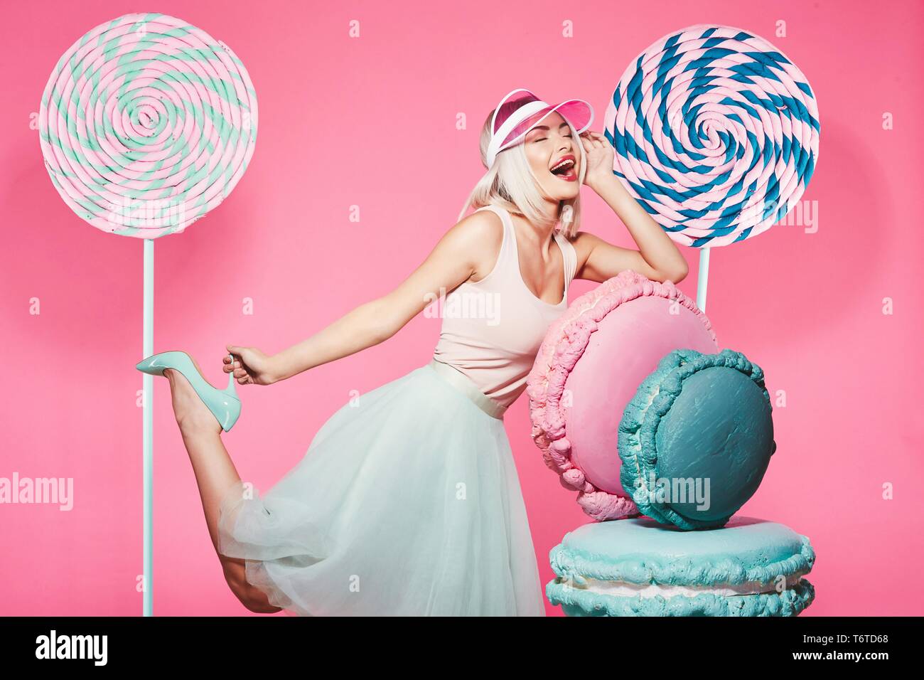 Attractive model with sweets Stock Photo - Alamy