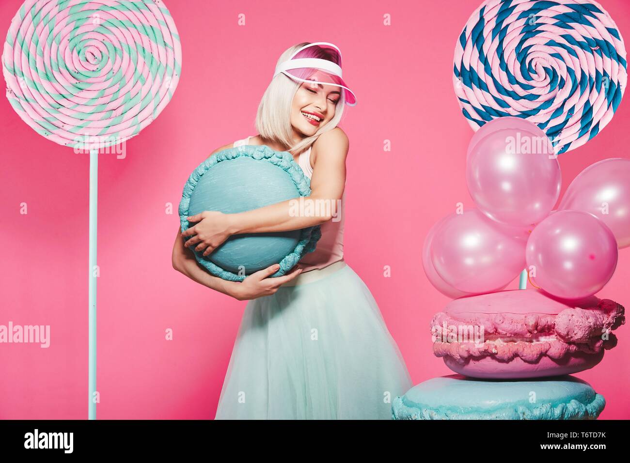 Attractive model with sweets Stock Photo - Alamy