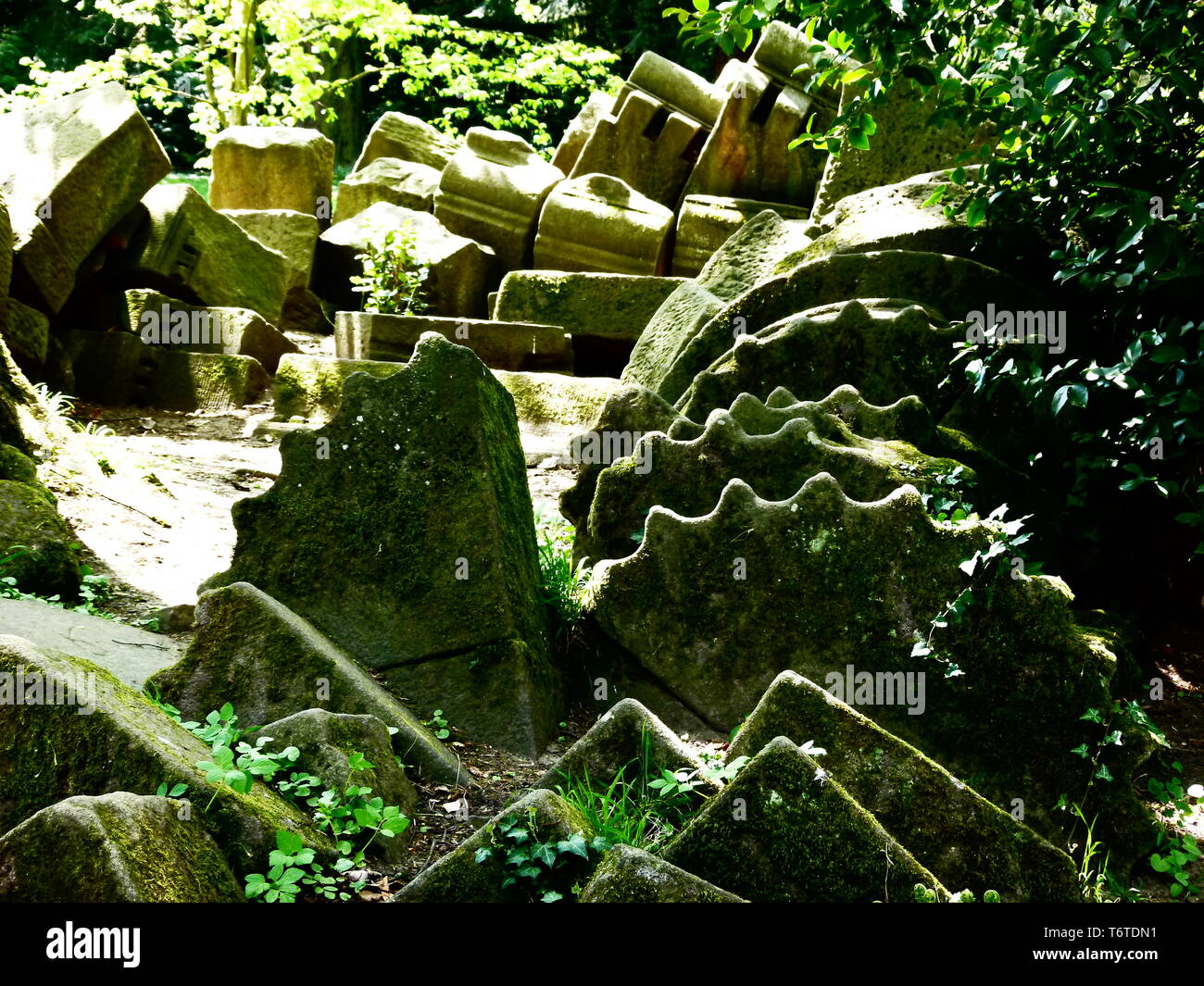 overturned historic stone pillar Stock Photo - Alamy