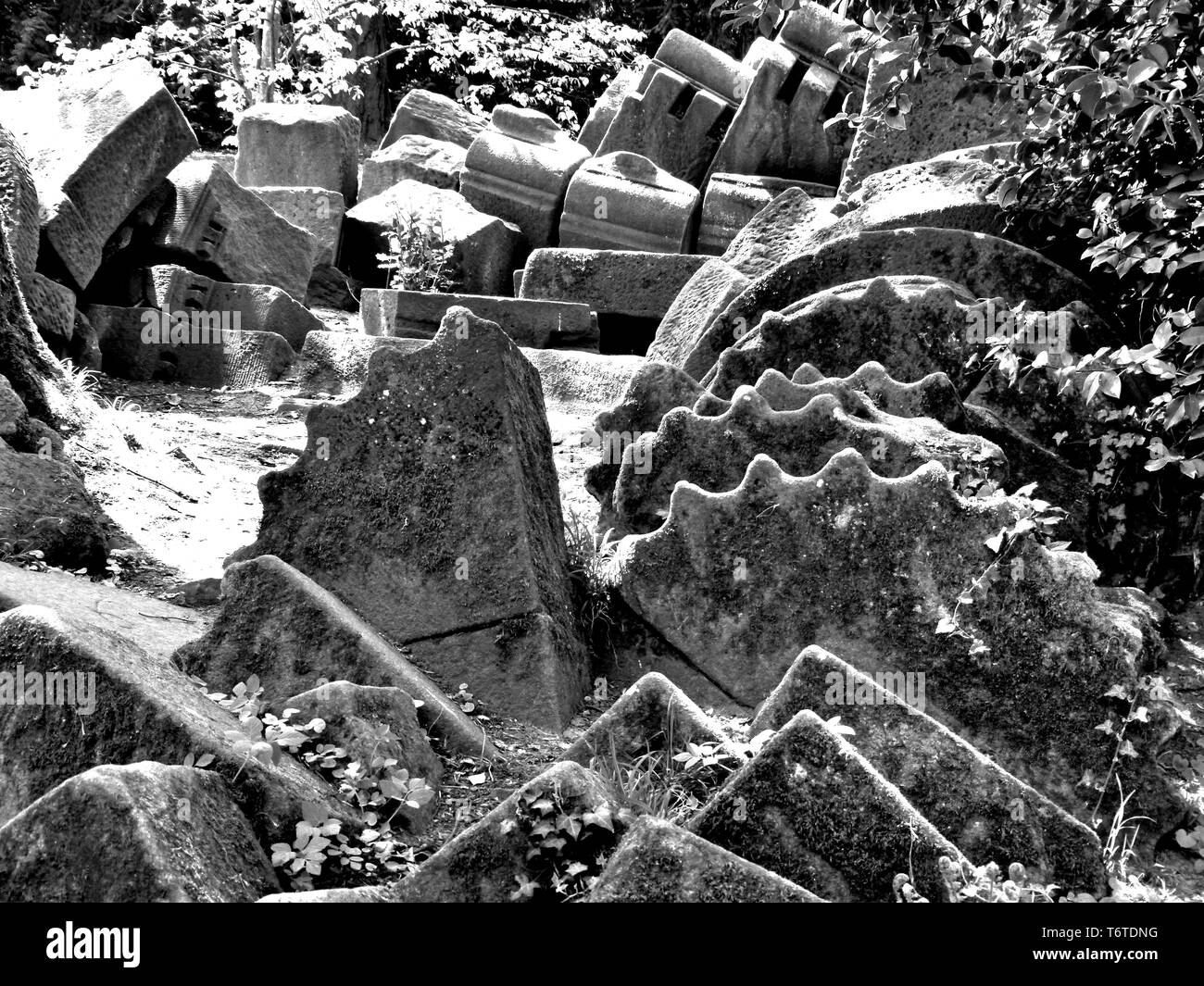 overturned historic stone pillar in black and white Stock Photo - Alamy