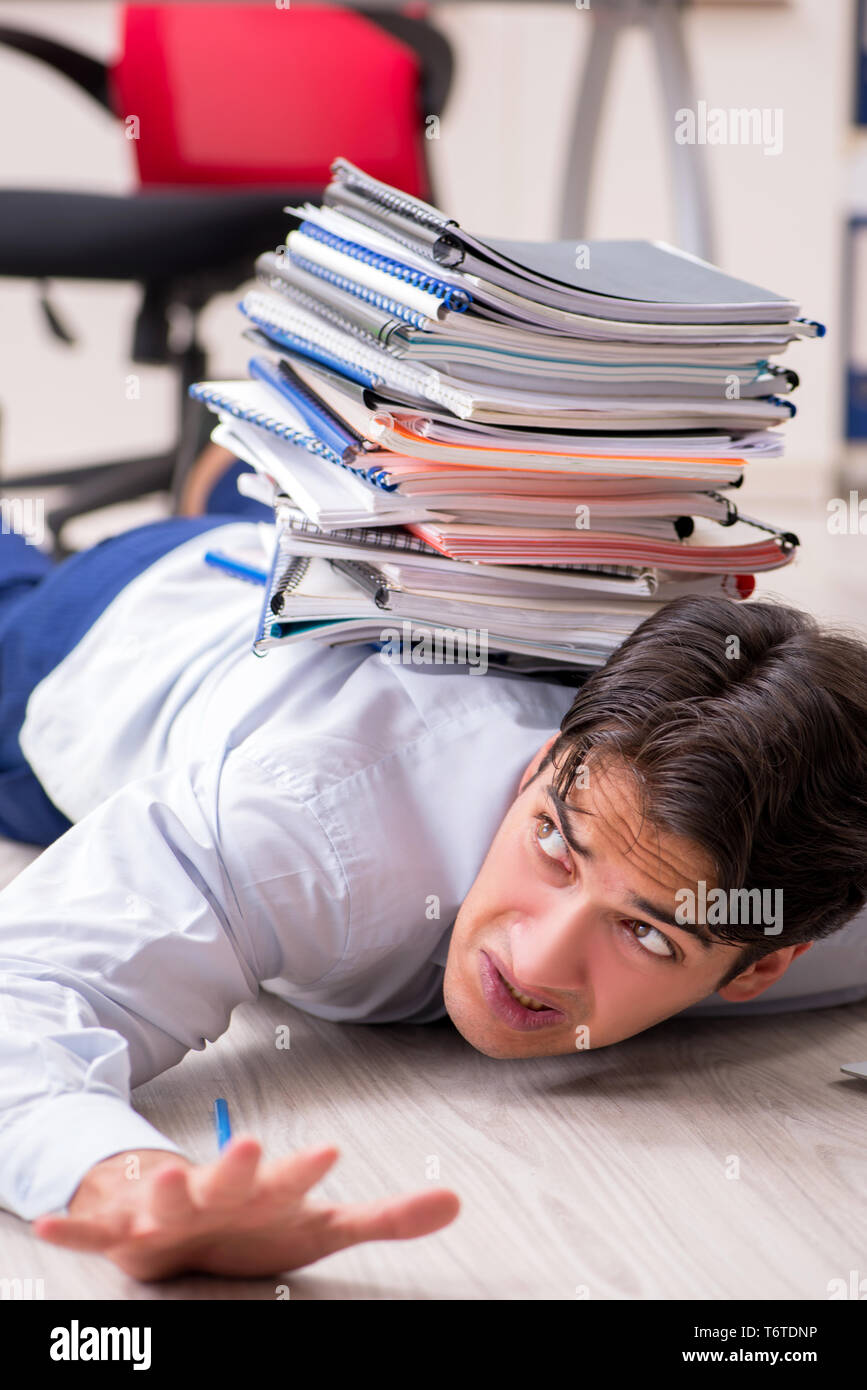 Extremely busy employee working in the office Stock Photo - Alamy