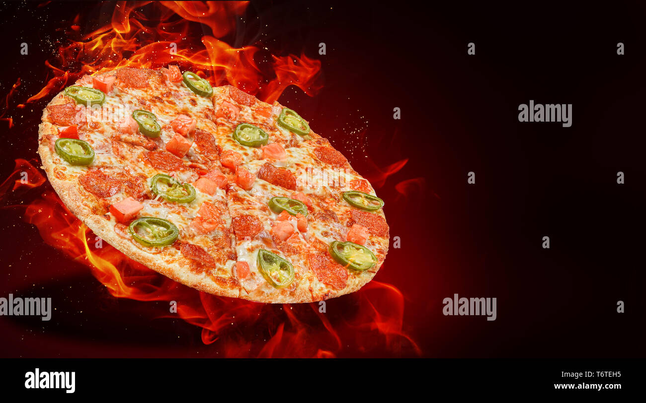 hot fresh traditional italian pizza in flames Stock Photo - Alamy