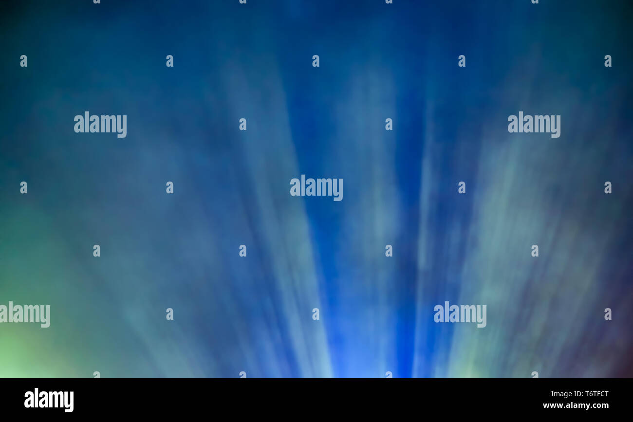 color blured projector light beam through smoke Stock Photo - Alamy