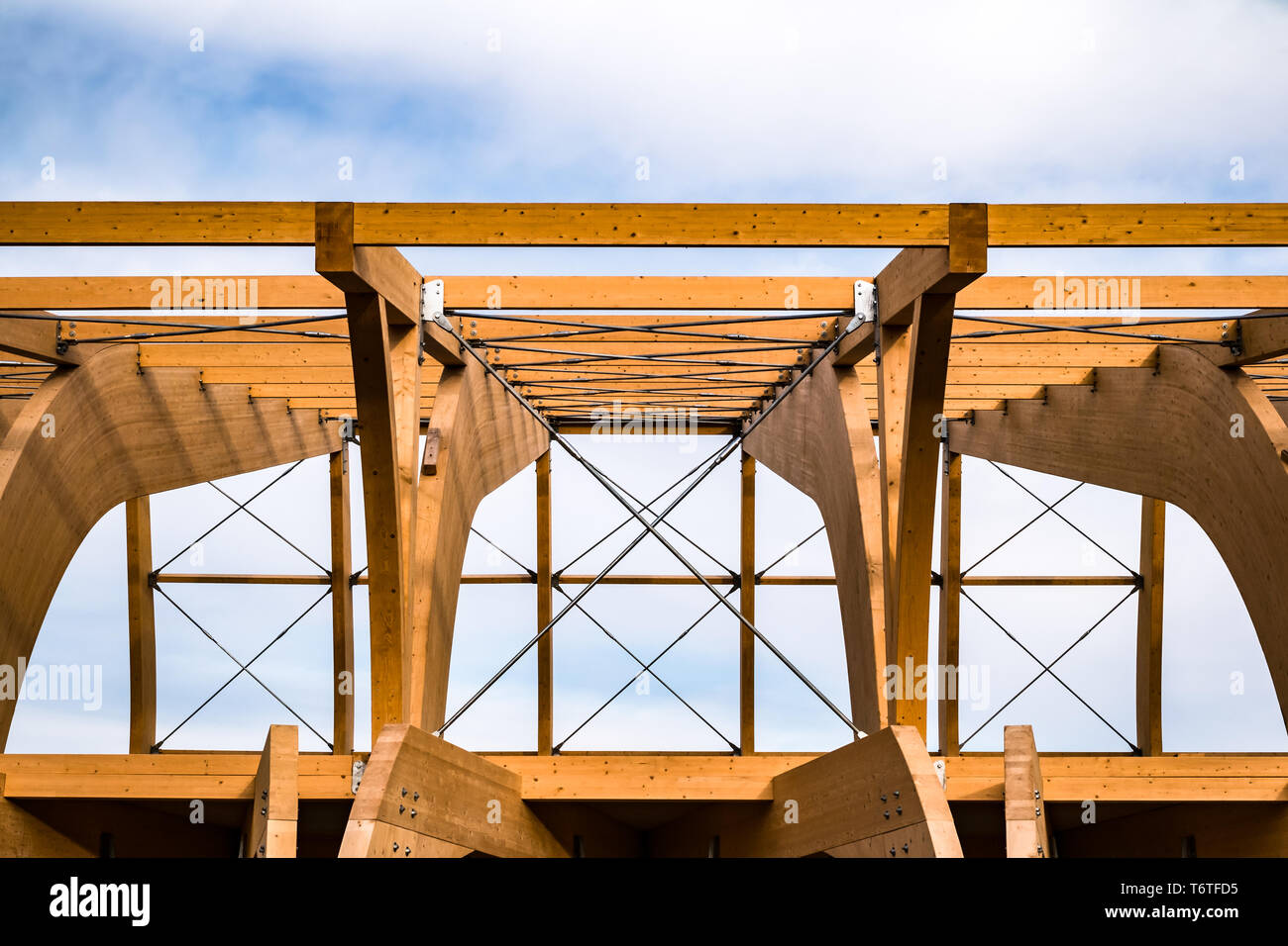 Detail of a modern wooden architecture in glued laminated timber on a ...