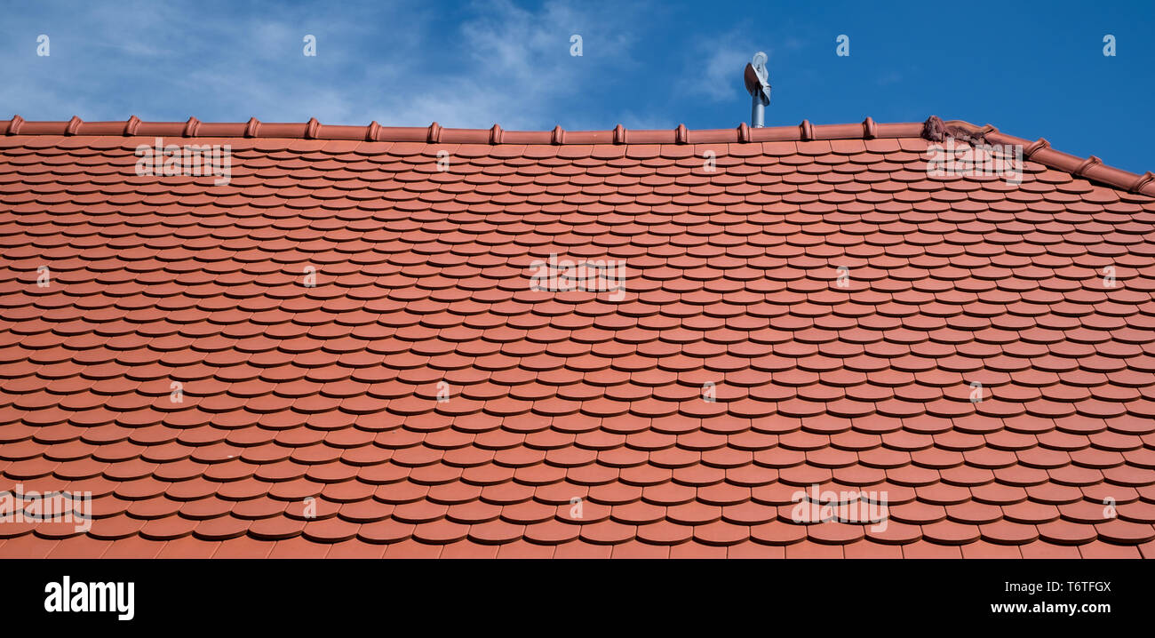 Modern roof tiles red color photographed in the distance Stock Photo ...