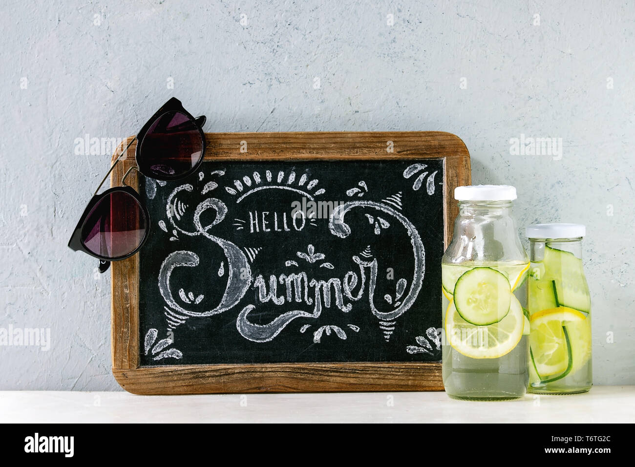 Summer theme on sand Stock Photo - Alamy