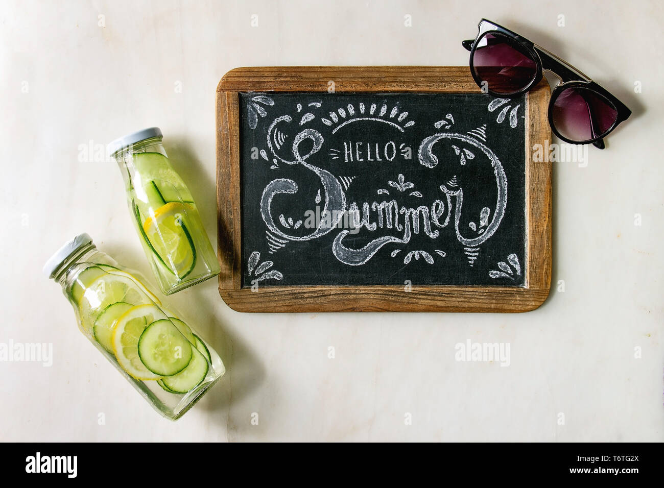 Summer theme on sand Stock Photo - Alamy