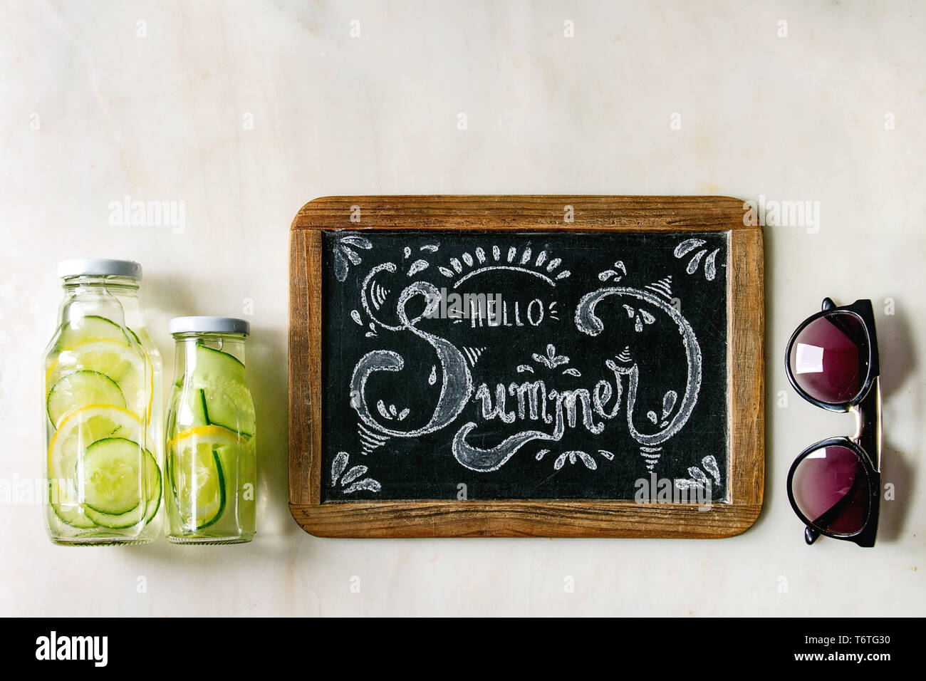 Summer theme on sand Stock Photo - Alamy