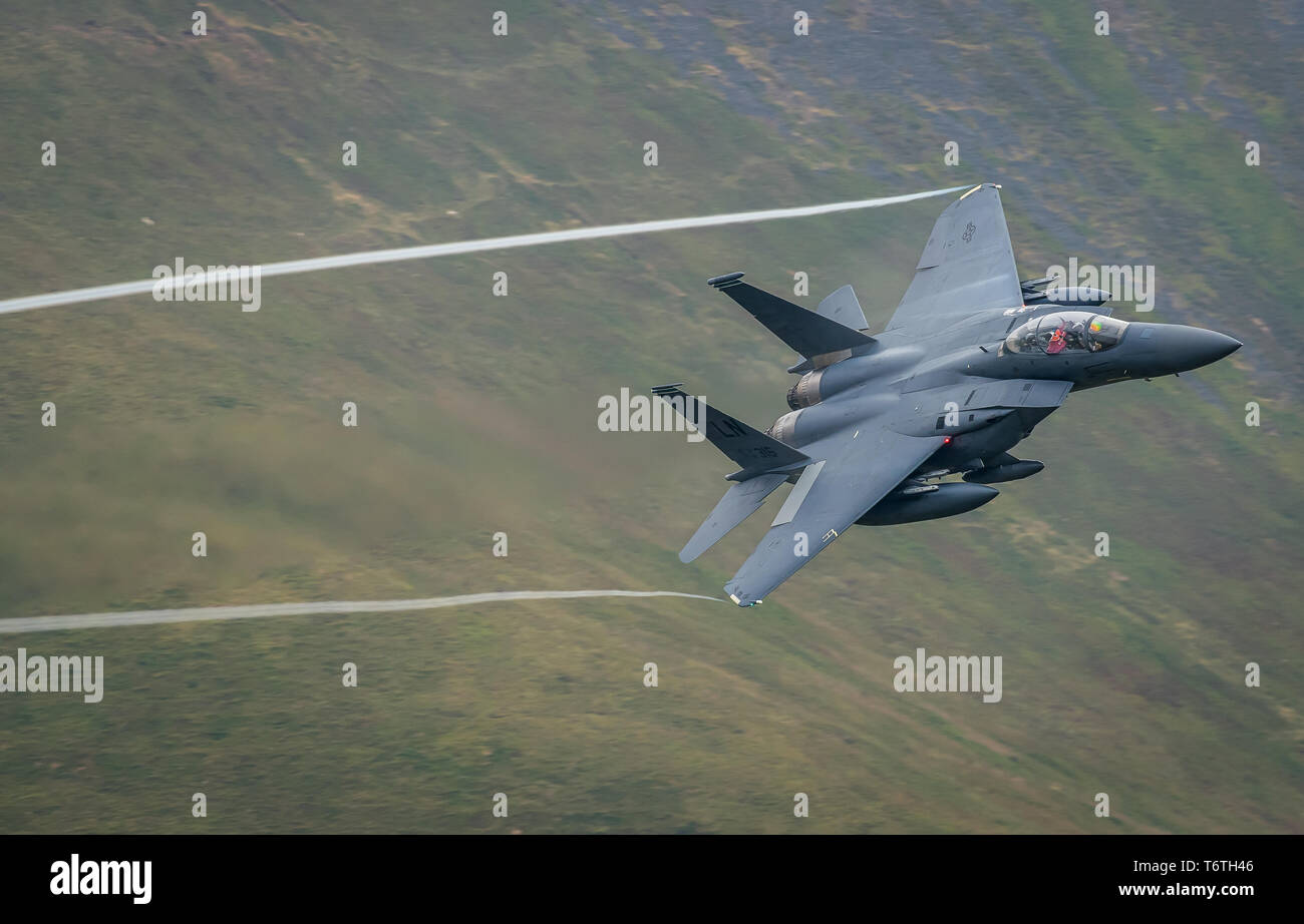 USAF F-15s doing Low Level training through North Wales Stock Photo - Alamy