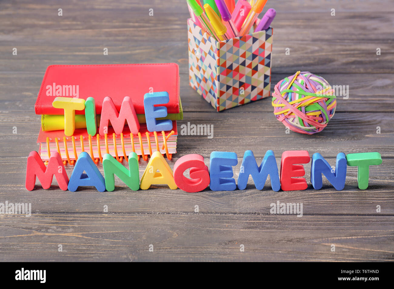 Composition with stationery and phrase "Time management" composed from ...
