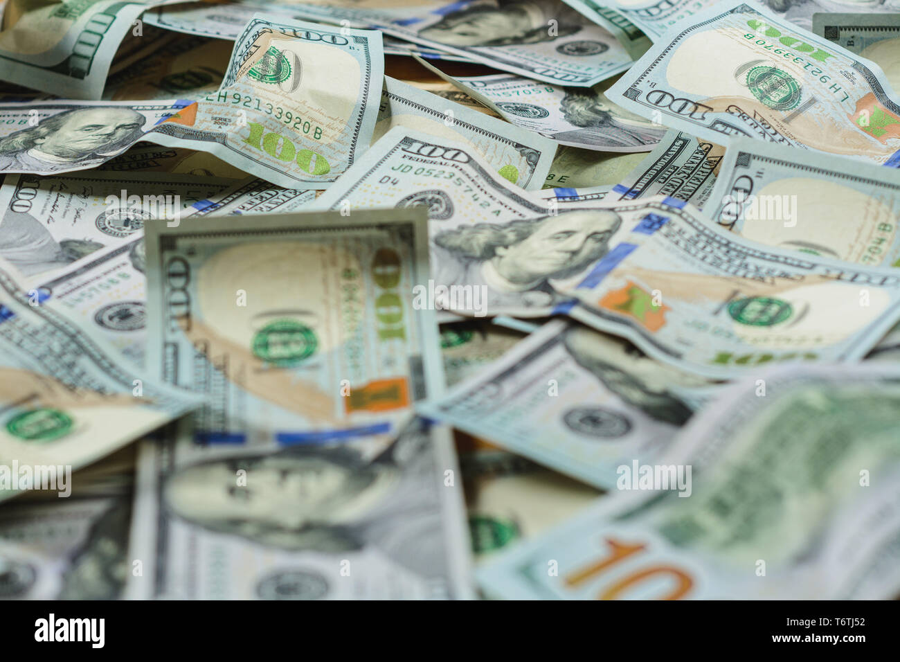 Dollar notes are lined up on a table close-up, a texture of dollar bill ...