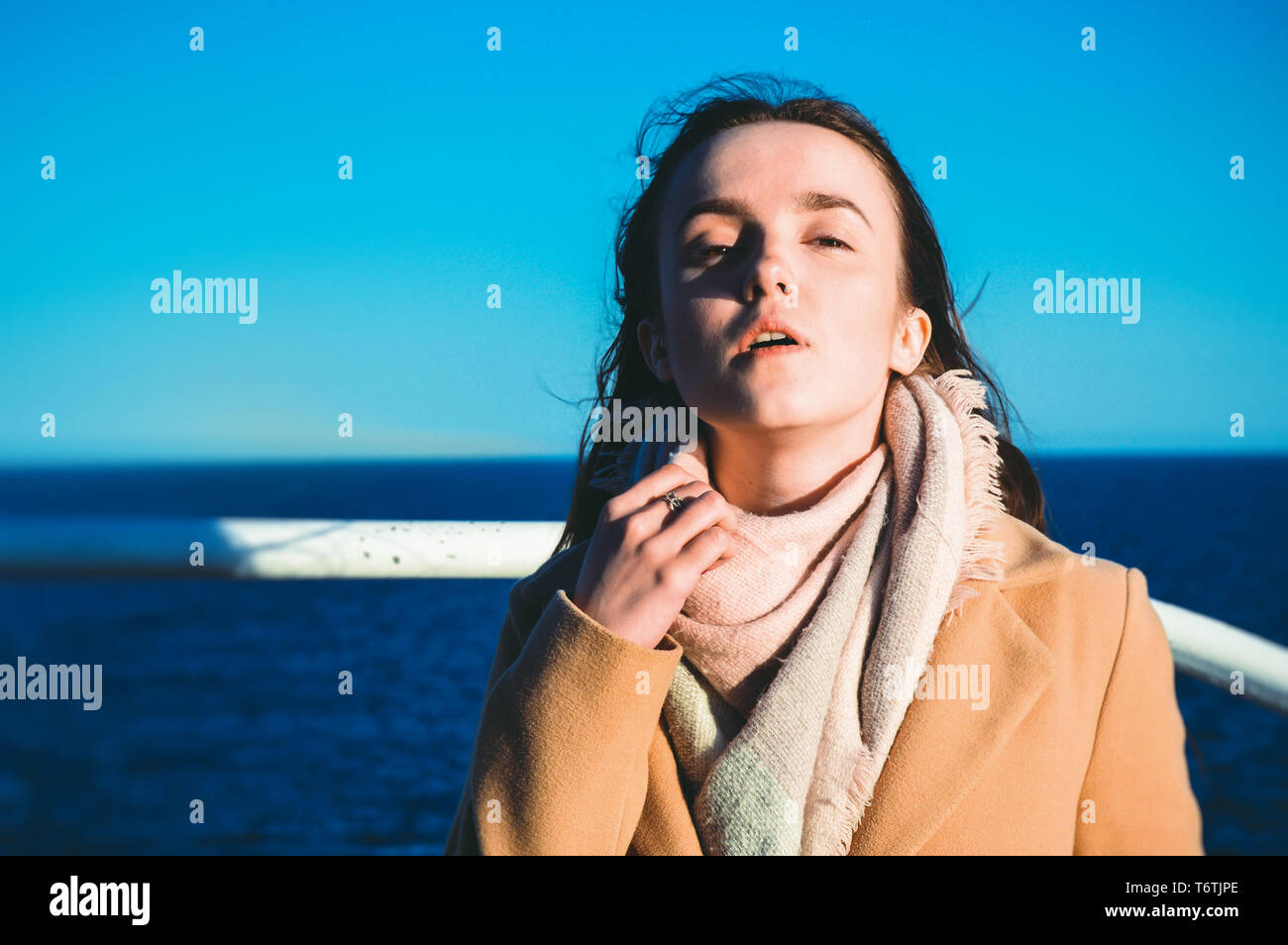 Close up portrait woman enjoying the sea from ferry. Sea life, spring ...