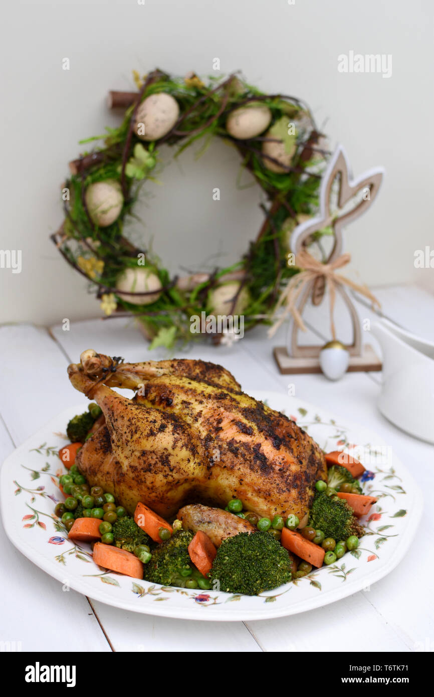Roasted chicken with spring vegetable Stock Photo - Alamy