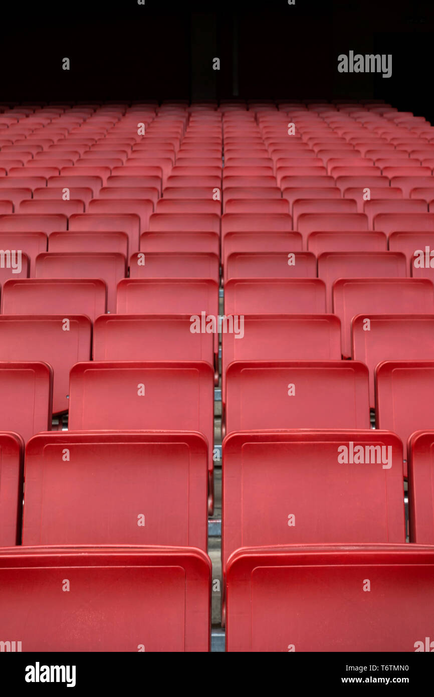 Red seat row in stadium Stock Photo - Alamy