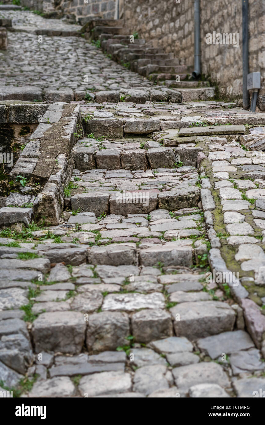 Cobblestoned passage in Kotor Old Town Stock Photo - Alamy