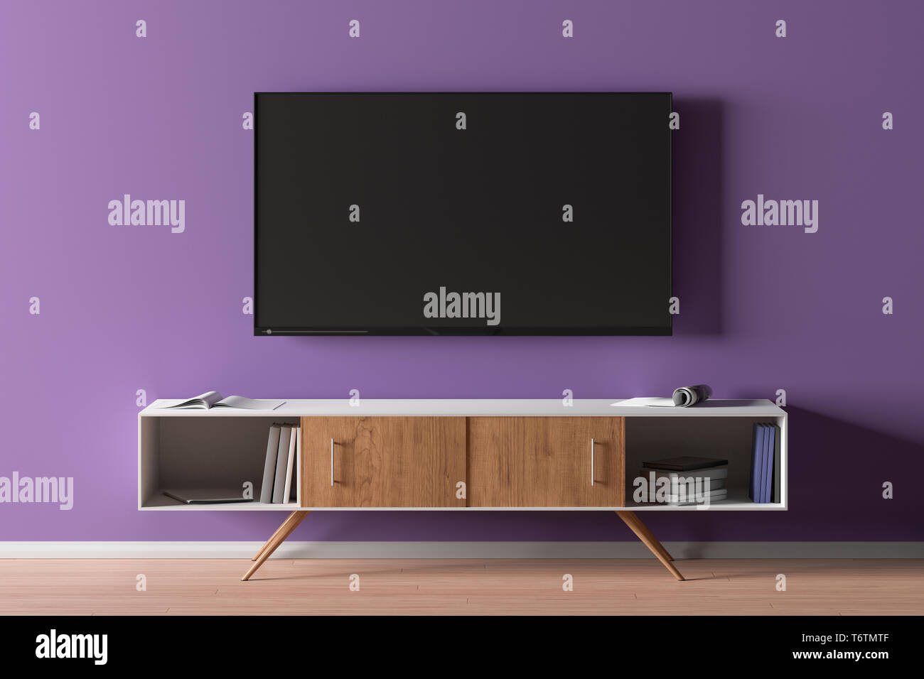 TV screen on the purple wall in modern living room Stock Photo - Alamy