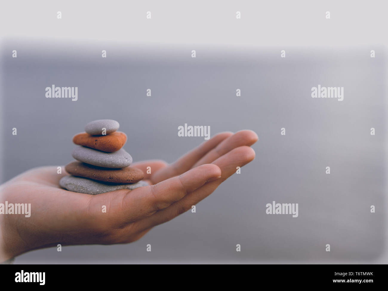 Five stones in sea hi-res stock photography and images - Alamy