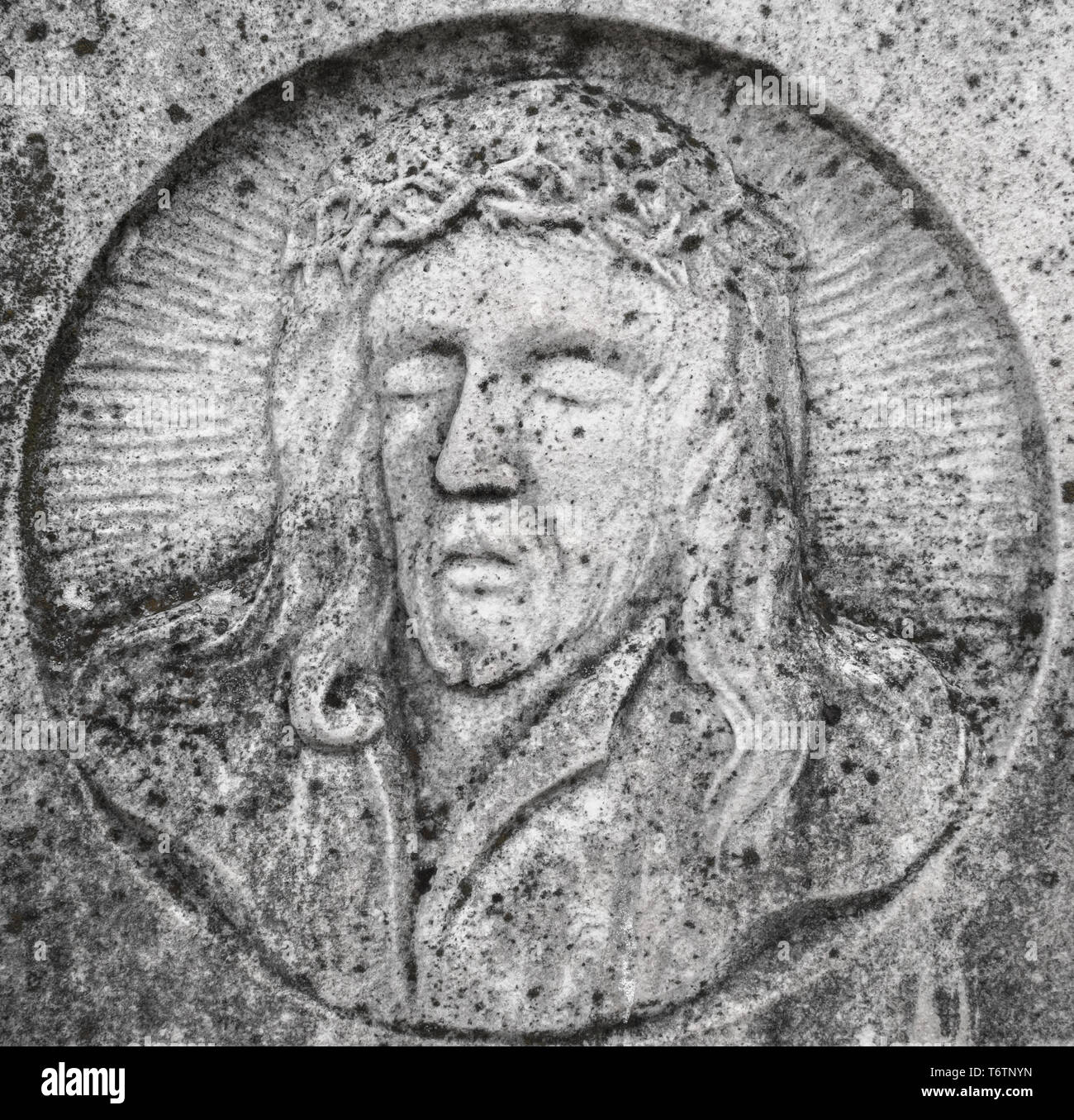 Stone Bas-relief of the face of Christ Stock Photo - Alamy