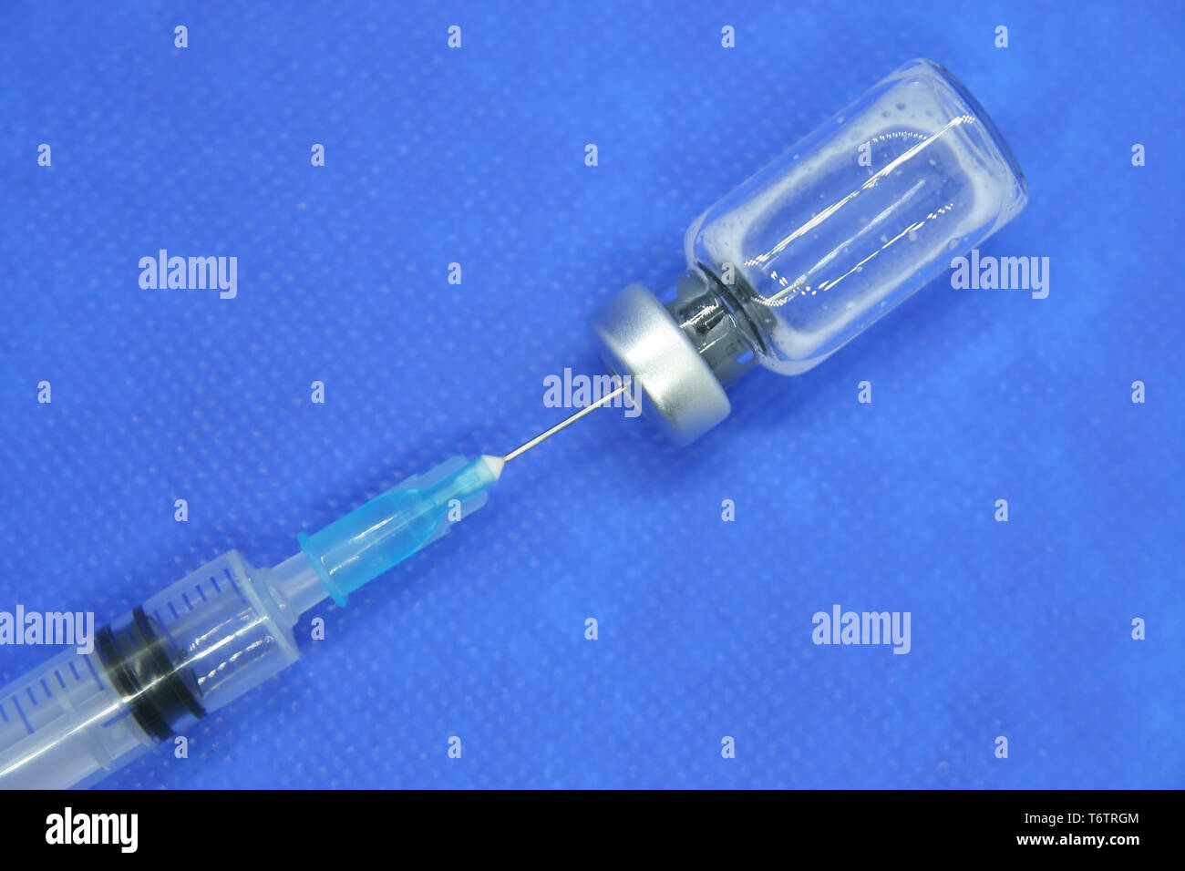 Medical syringe and ampule. Cure in injection. Medicine in a bottle ...