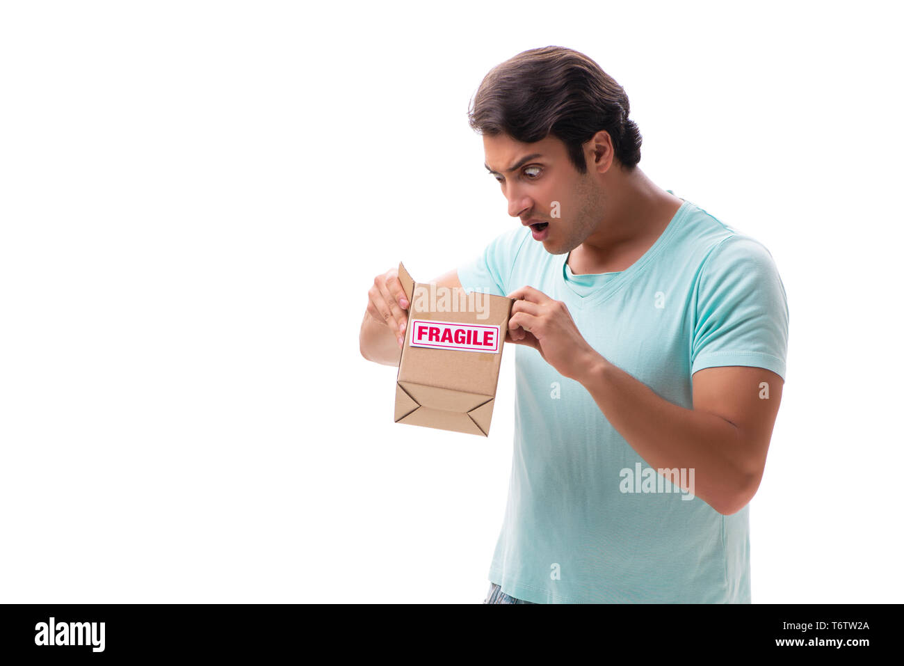 Shocked young man shopping Cut Out Stock Images & Pictures - Alamy