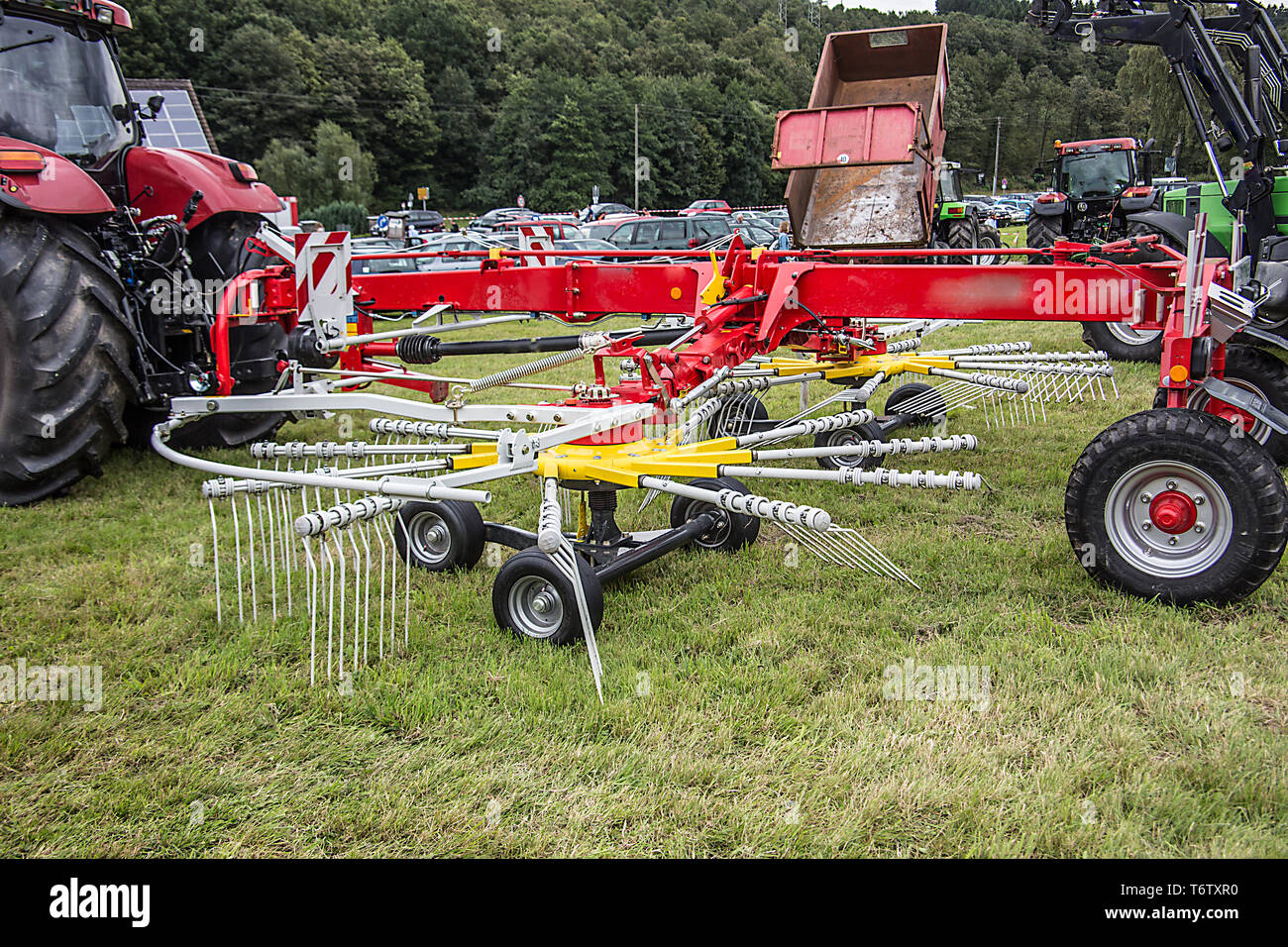 Pasture agricultural machinery Stock Photo - Alamy