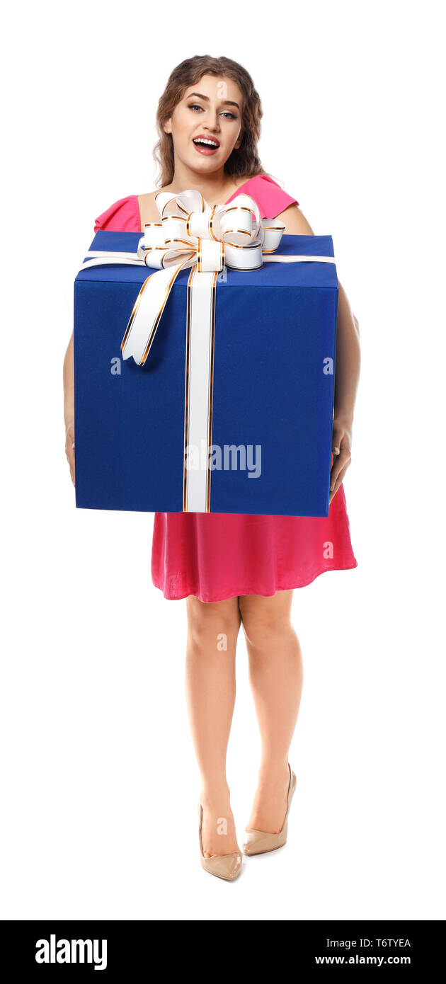 Beautiful young woman with big gift box on white background Stock Photo ...