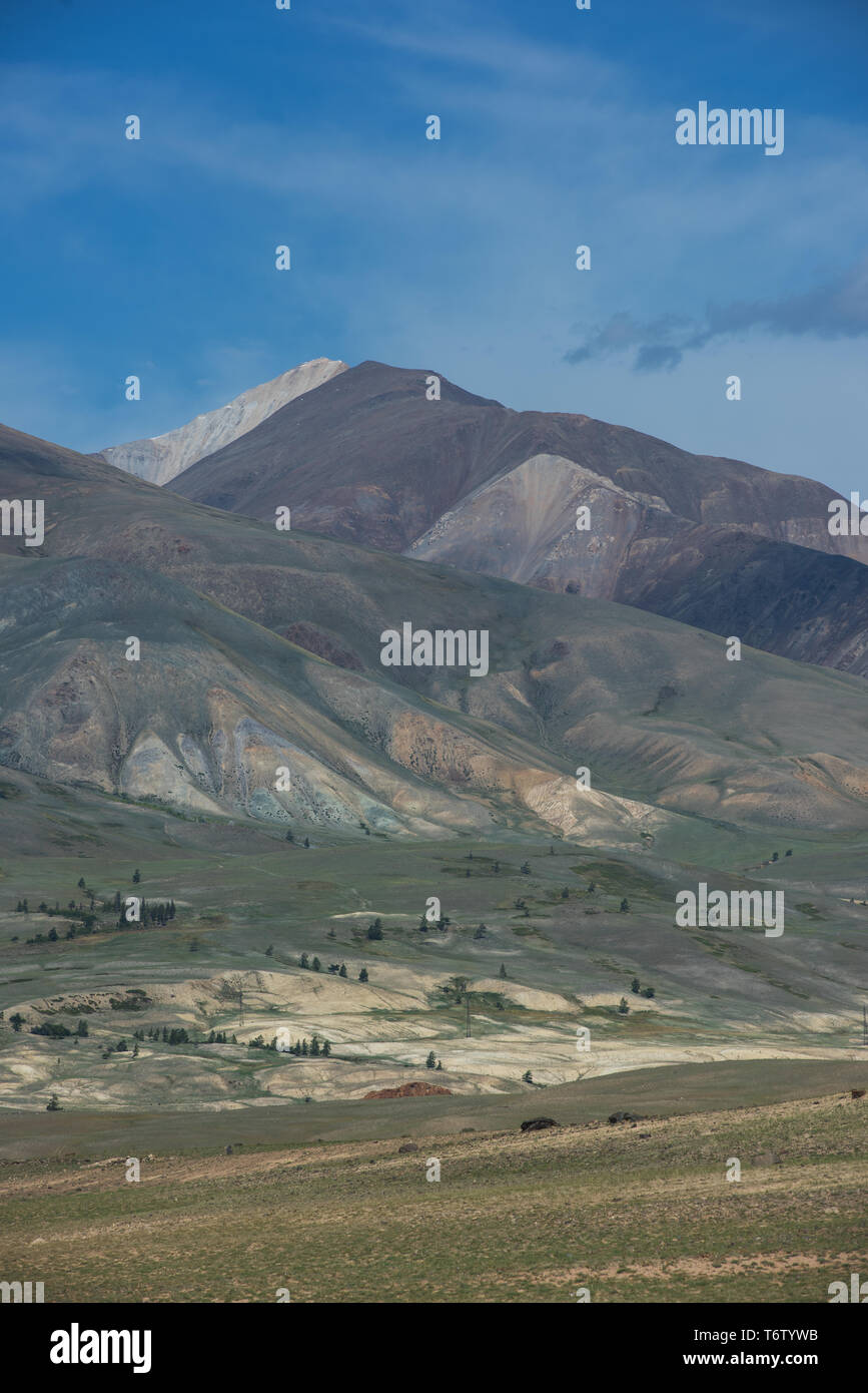 Different colored mountains Stock Photo - Alamy