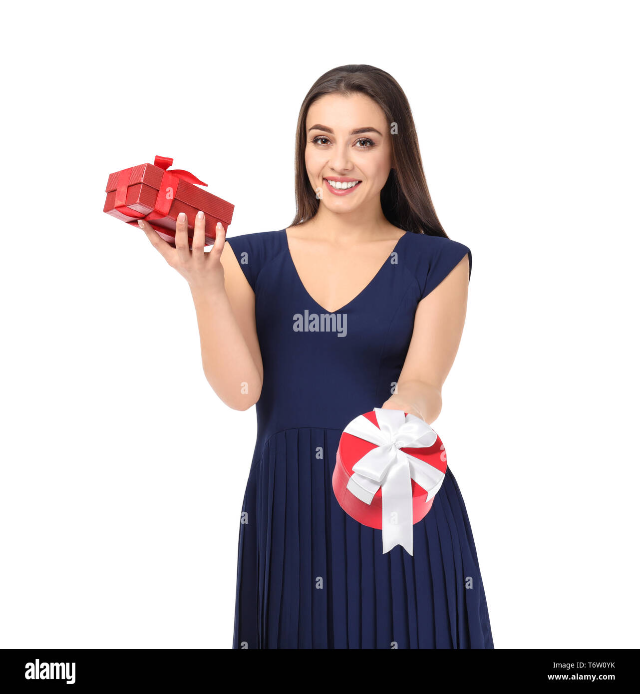 Beautiful young woman with gift boxes on white background Stock Photo ...