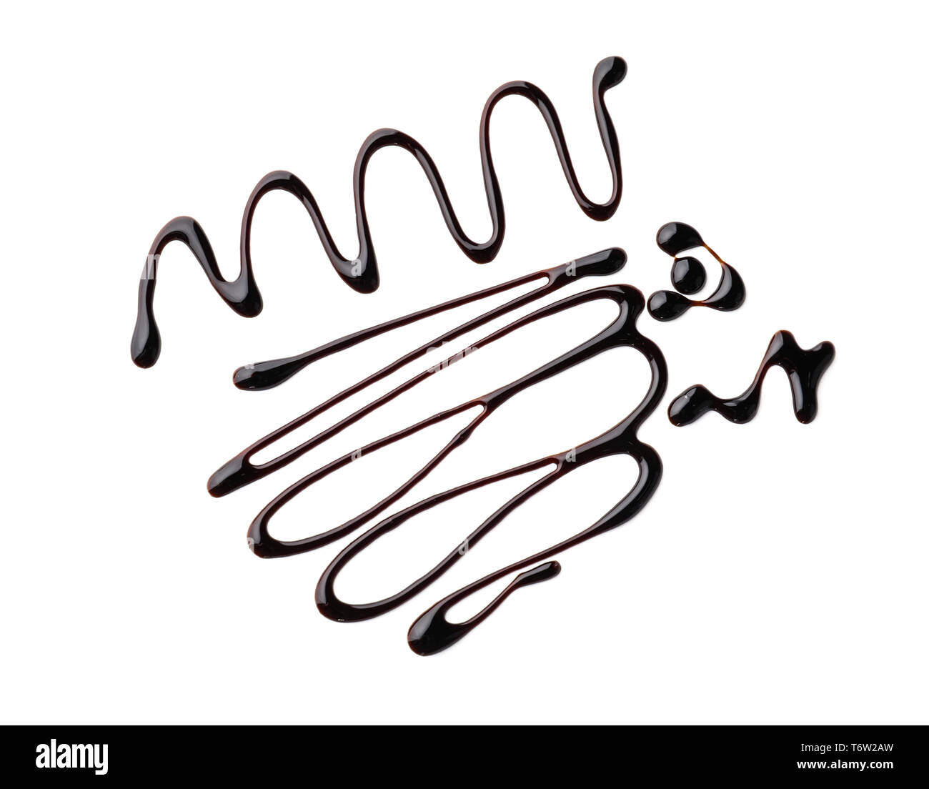 Pattern made with molten chocolate on white background Stock Photo - Alamy