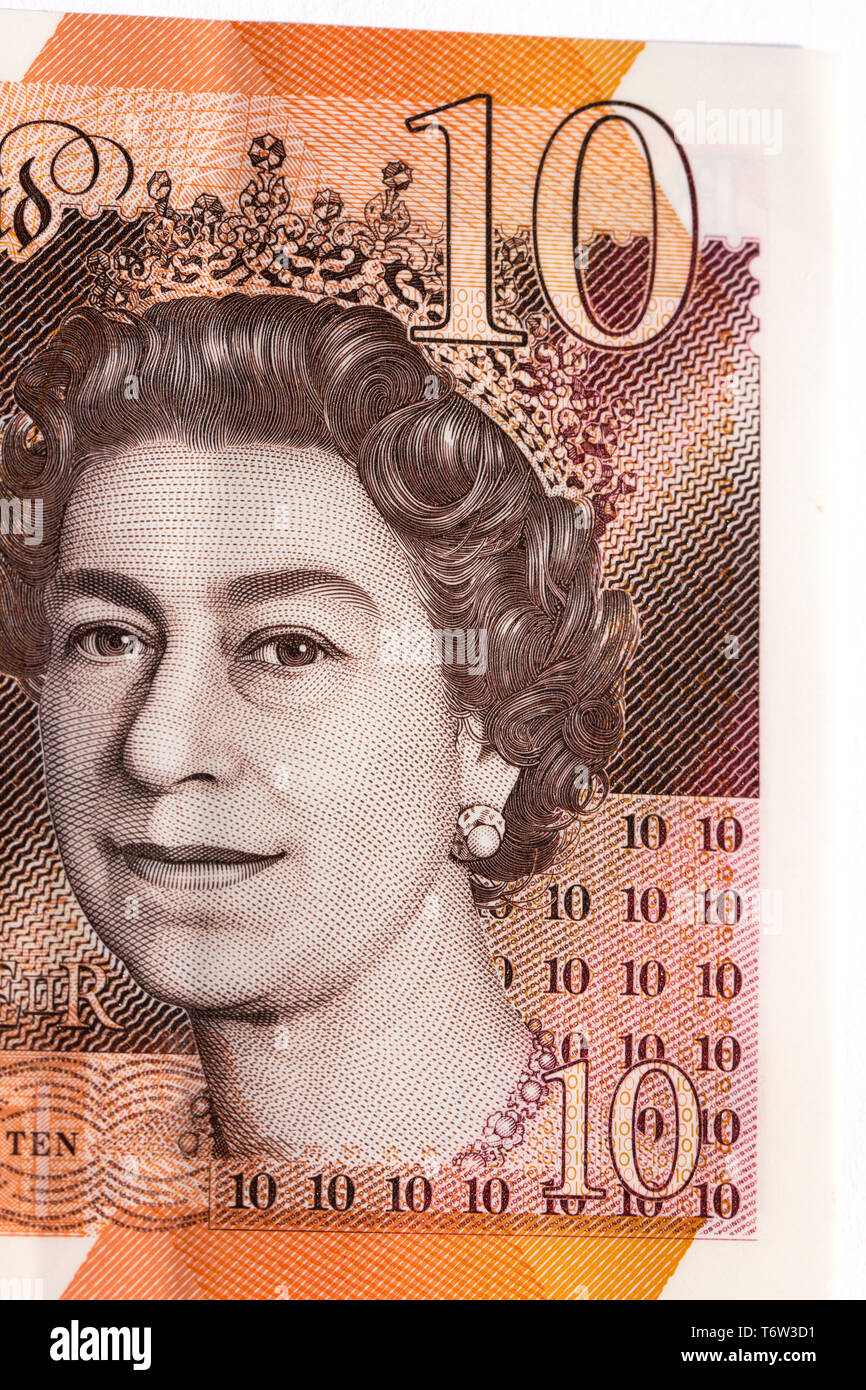 Close-up, macro photo of piece of £10 banknote. Ten pounds sterling ...