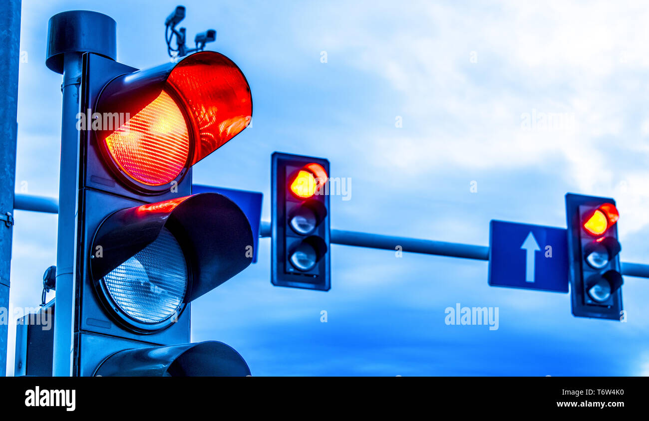 Traffic lights over urban intersection Stock Photo - Alamy