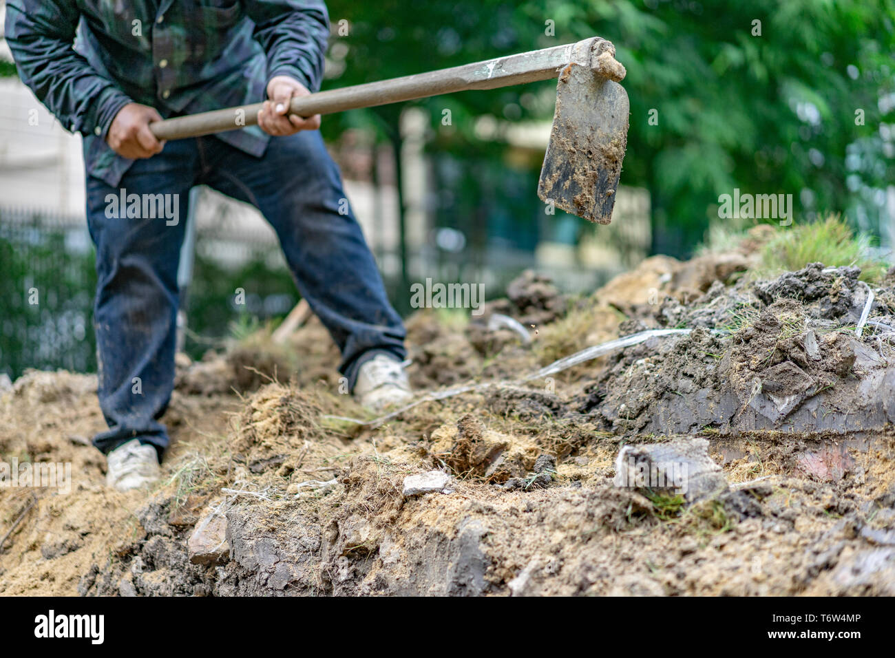 Man digging clay garden hi-res stock photography and images - Alamy